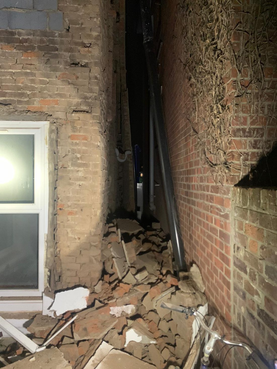 Residents evacuated following wall collapse on terrace property ...